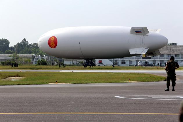 Airship crash hurts four