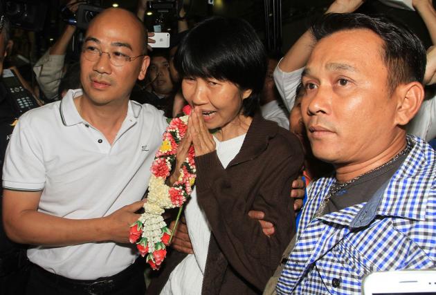 Freed activist Ratree arrives home