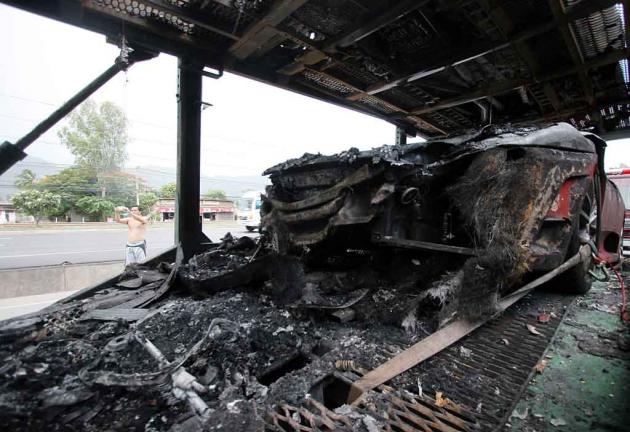 Luxury cars destroyed in semi-trailer blaze