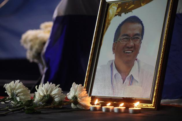 Protest leader shot dead, 10 hurt in melee with reds