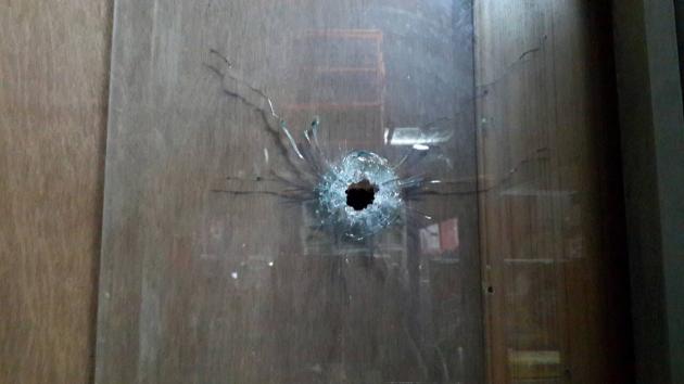 Protester's shop shot up