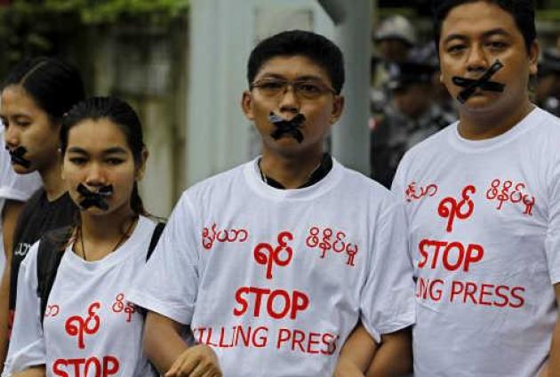 3 journalists charged for silent protest