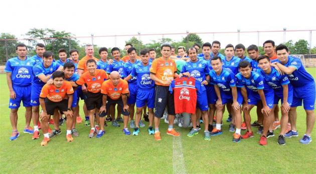 National football squad |peels off to help a teammate