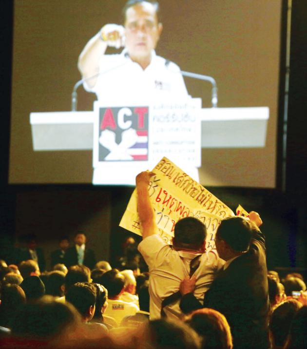 PM sees funny side as student makes protest during speech