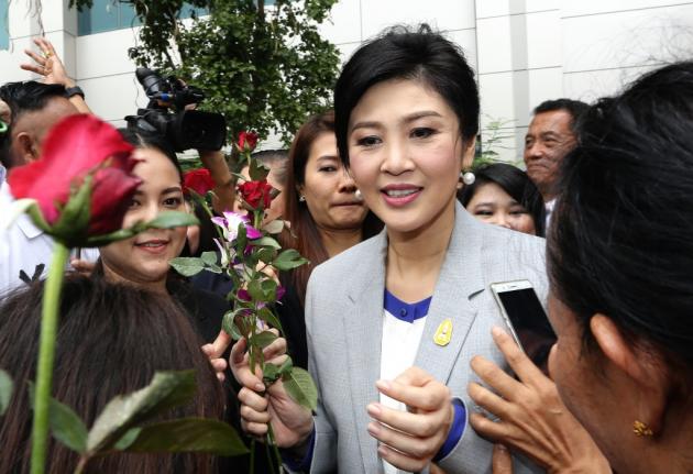 Yingluck appears in court for rice-pledging case