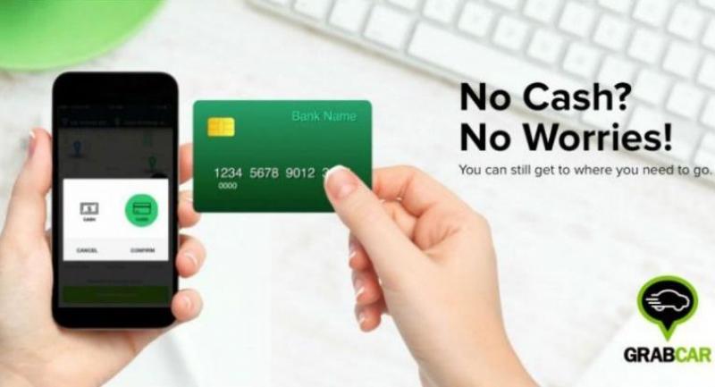 Grab partners with card providers to promote cashless payment system