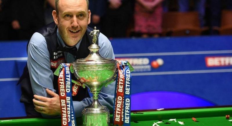 Williams rolls back years to claim third world snooker title