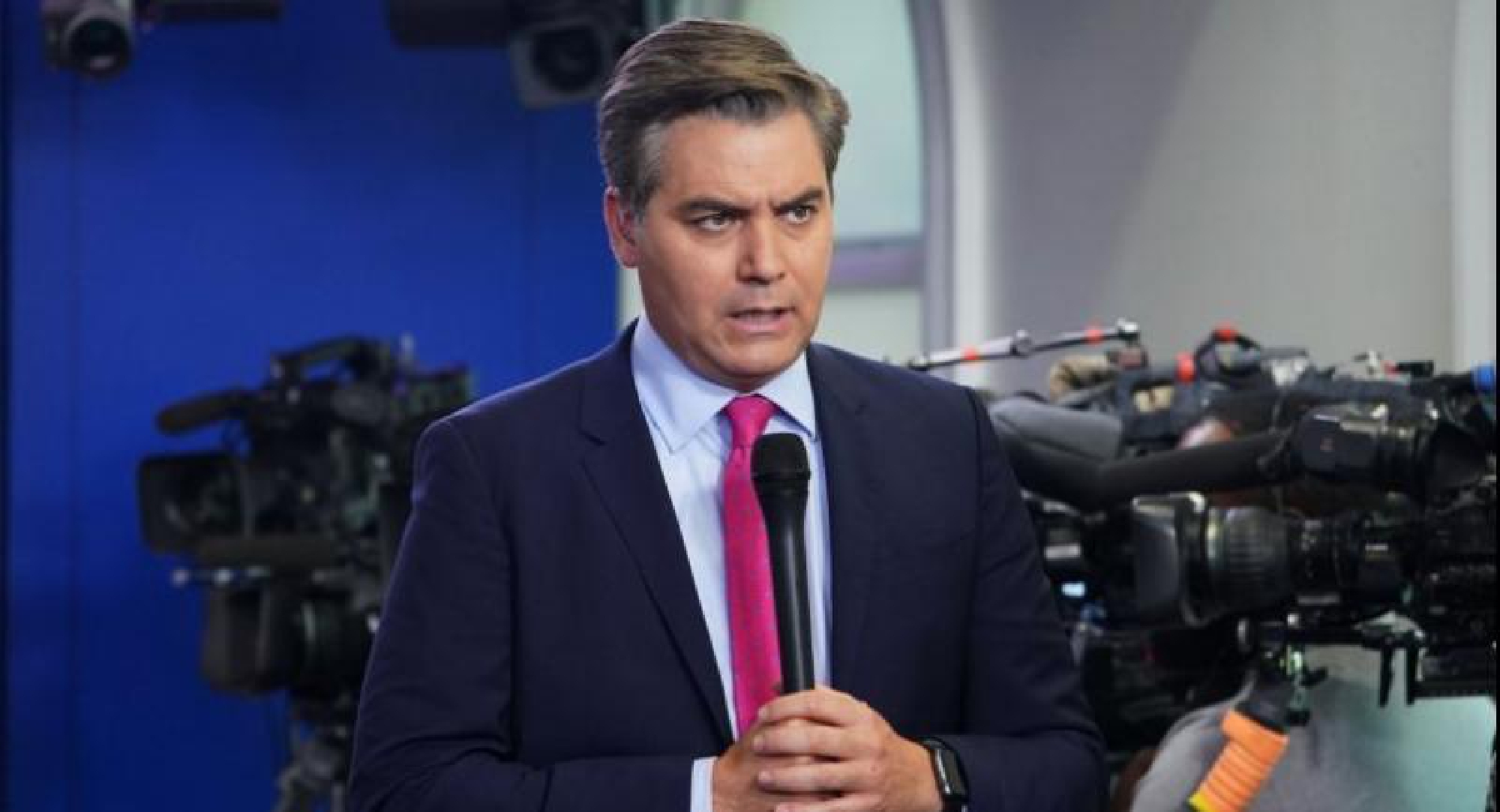 White House bars CNN reporter after heated Trump exchange