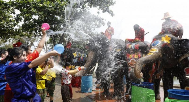 Water battles with elephants kick off festivities
