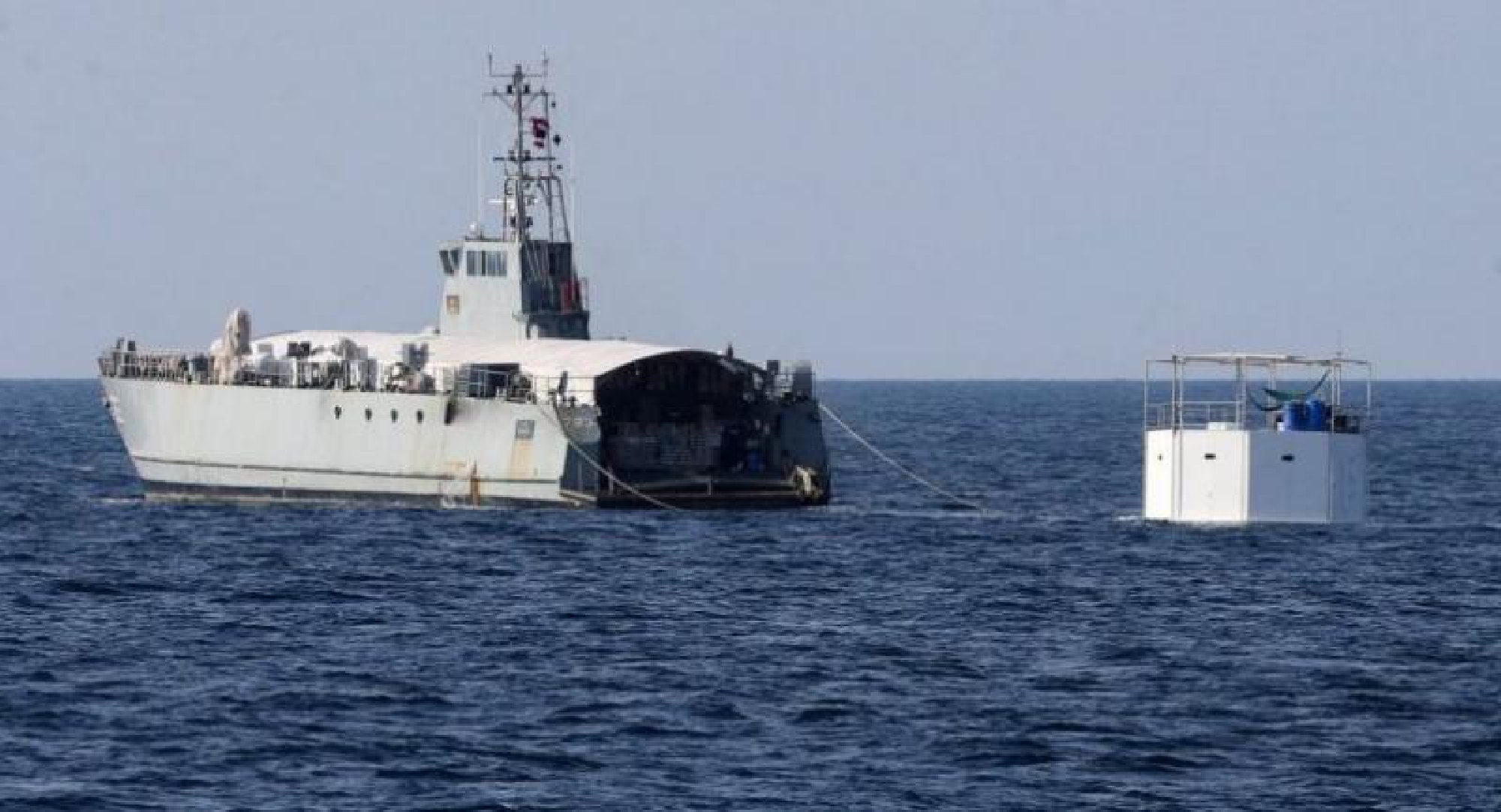 Seastead dismantled and being towed to port