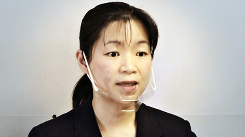 Interpreters in Japan don transparent masks during press conferences