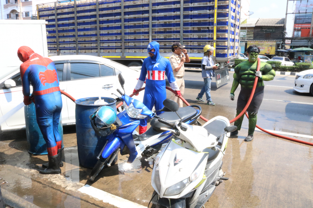 Superhero firemen cleanse the streets of PM2.5 dust in Nakhon Pathom