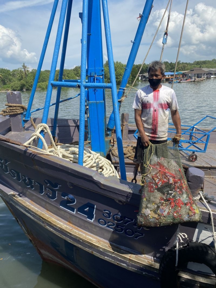 Fishermen head off to sea for a big catch of garbage