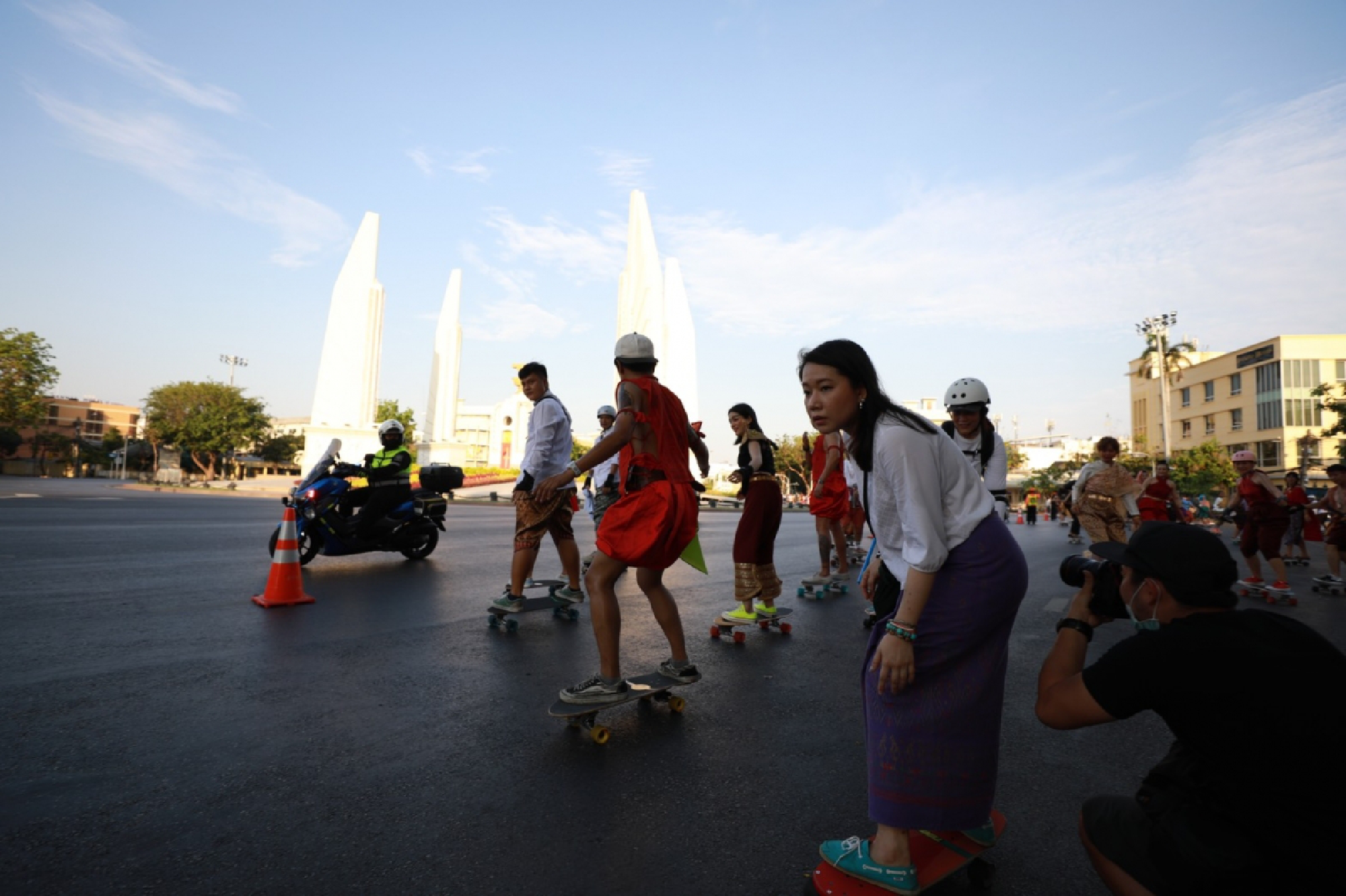 Skating in traditional costumes on a historic route