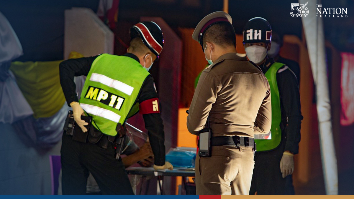 Police set up checkpoints as night curfew begins in Bangkok