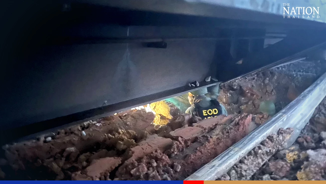 After second blast, bomb disposal officers scour area near derailed train