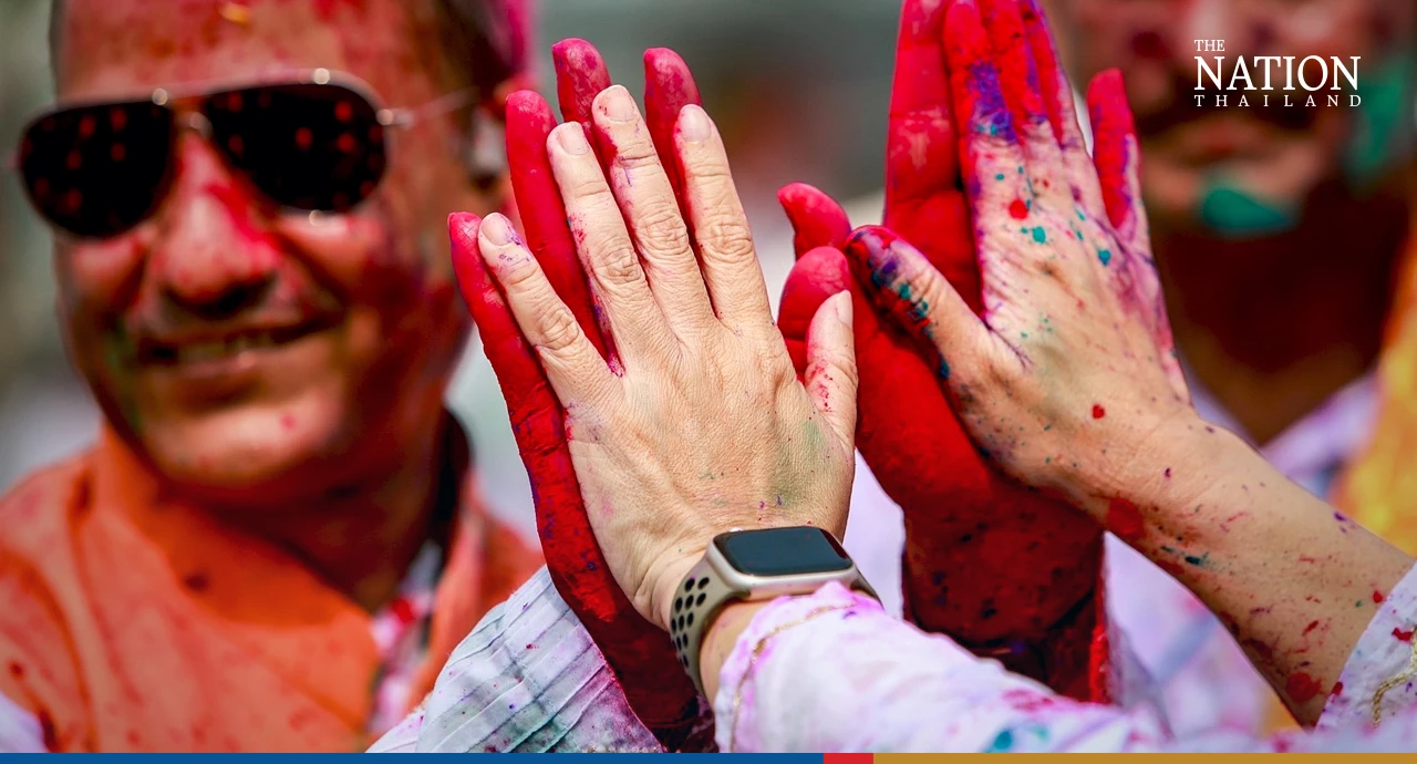 Politicians grab limelight as Holi colour bombs Bangkok