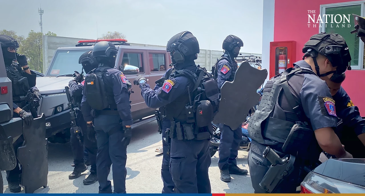 Tear gas, stun grenades fail to dislodge rogue cop in Bangkok standoff
