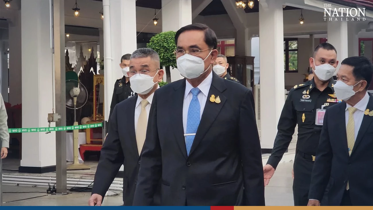 Glum-faced Prayut prays at city pillar after fleeing Chuwit ‘ambush’