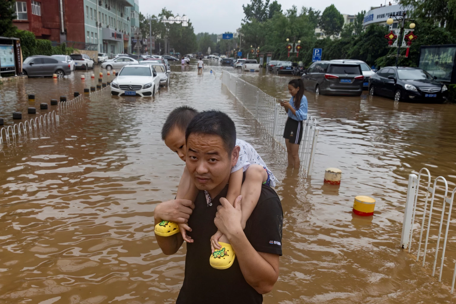 11 dead and 27 missing in Beijing's heavy rainfall