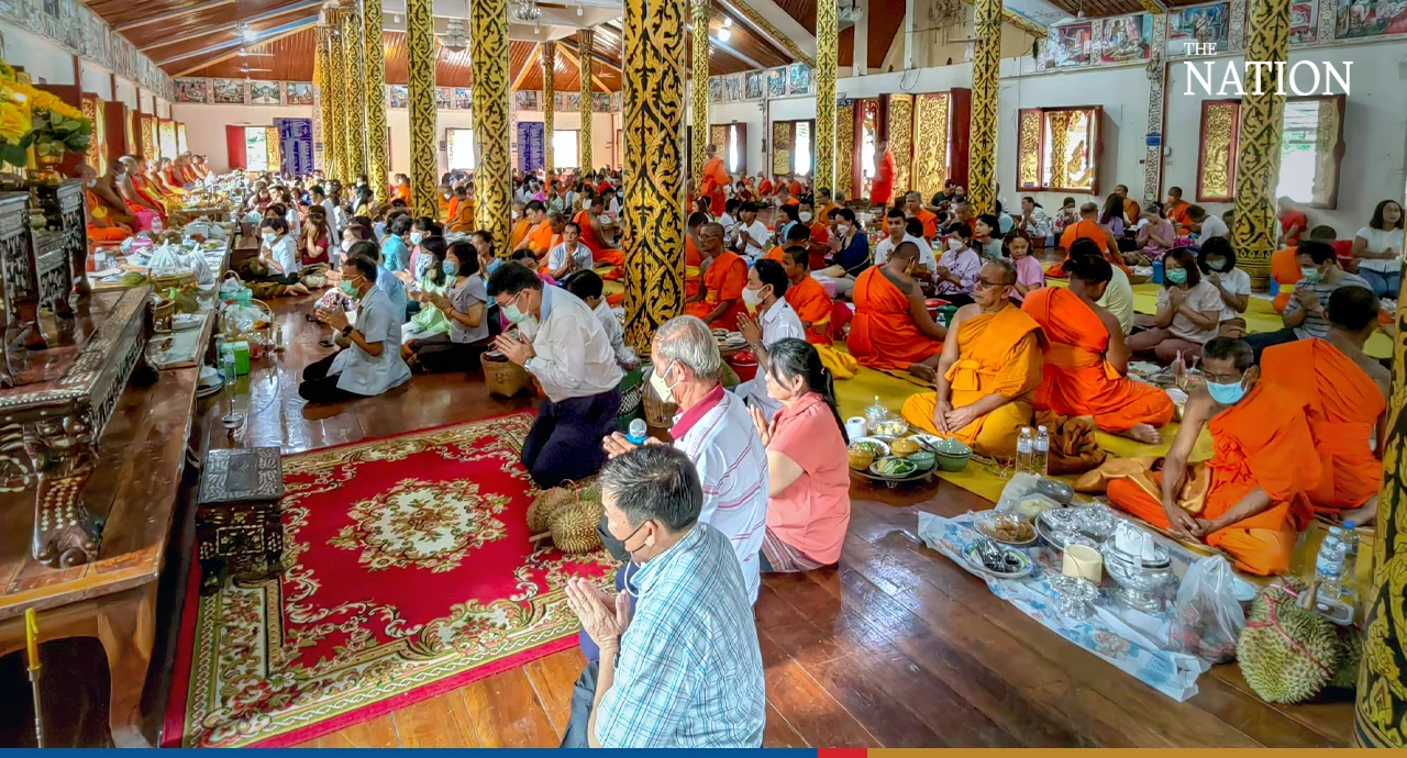 Uttaradit's unique temple tradition — making merit by offering durians