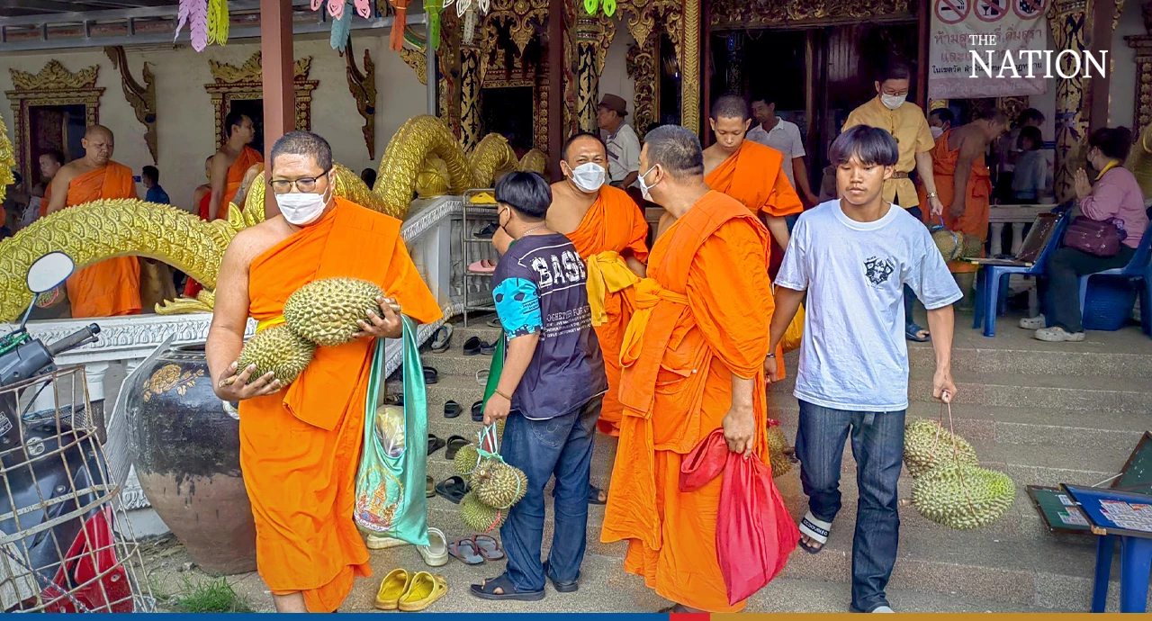 Uttaradit's unique temple tradition — making merit by offering durians