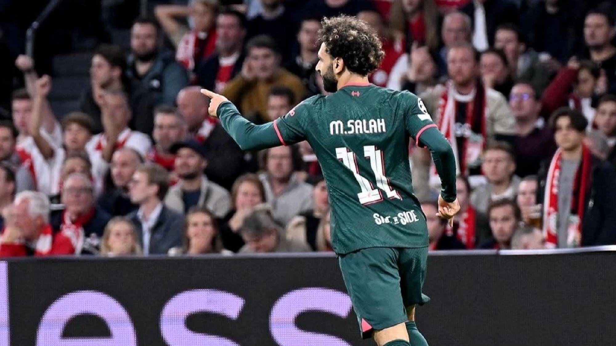 Liverpool qualify for Champions League knockouts with win at Ajax