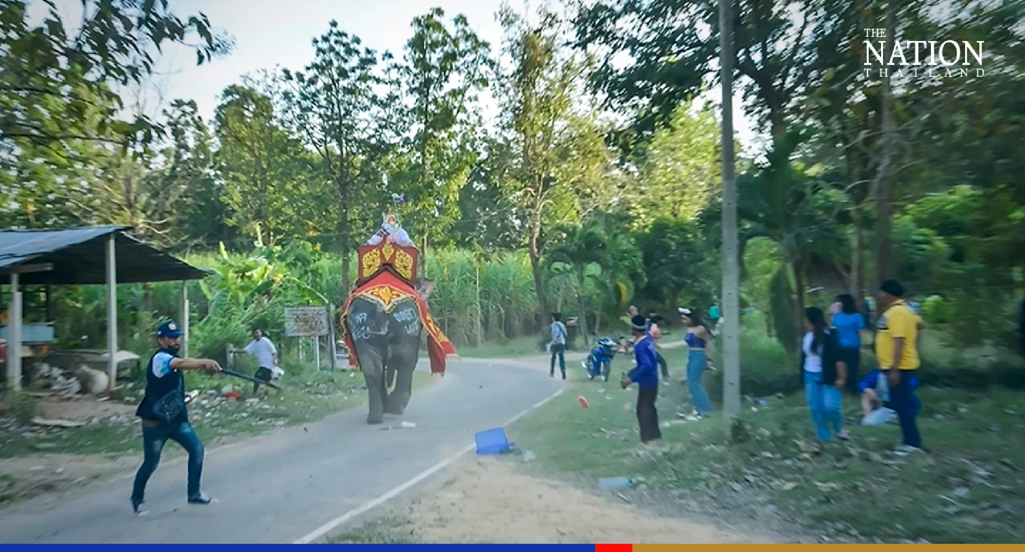 Furious elephant stomps people at ordination ceremony in Buriram